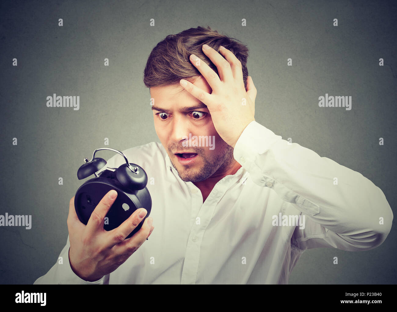 Clock man business time pressure hi-res stock photography and images ...