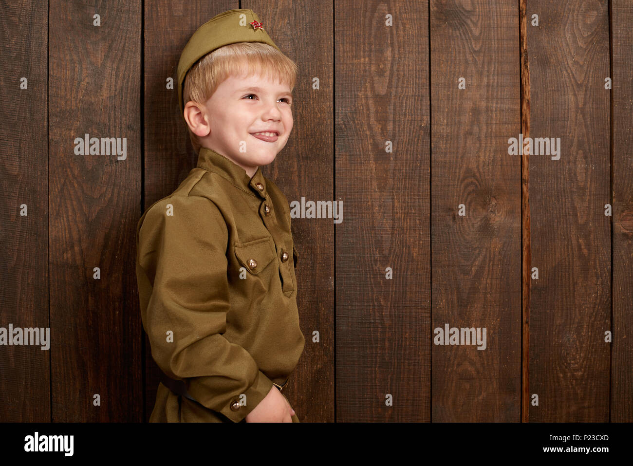 children are dressed as soldier in retro military uniforms Stock Photo ...