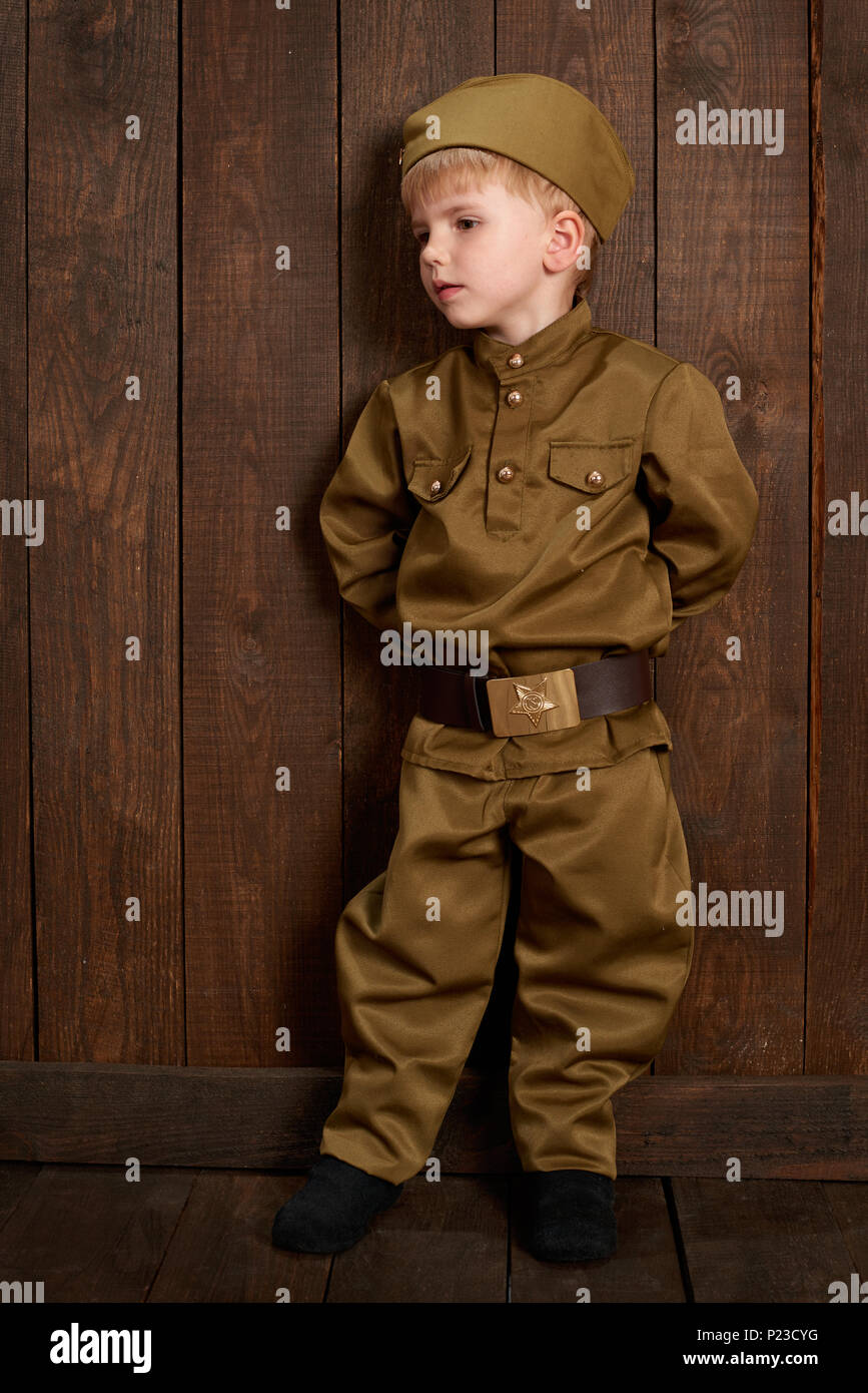 children are dressed as soldier in retro military uniforms Stock Photo ...