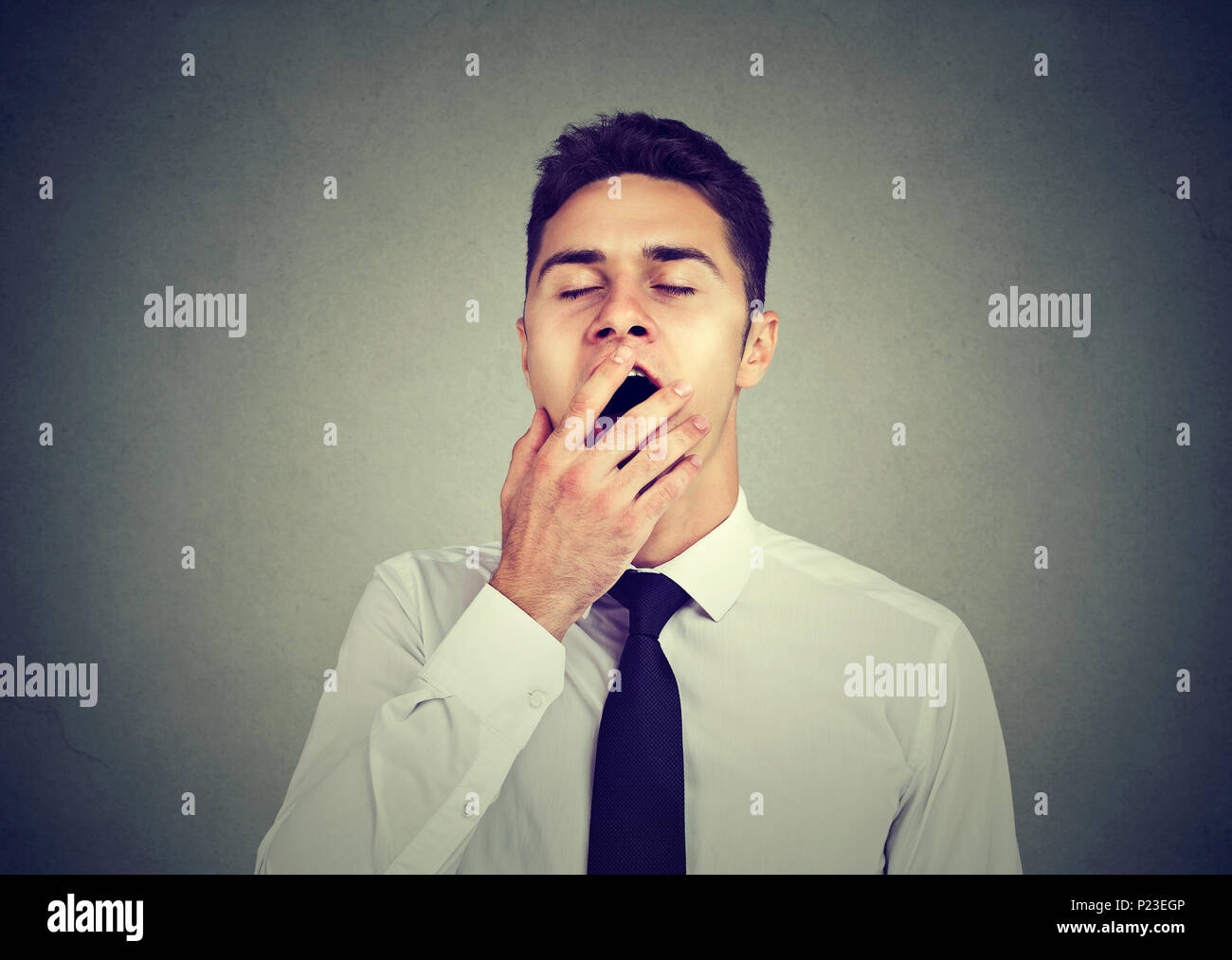 Man with hand over his mouth hi-res stock photography and images - Alamy