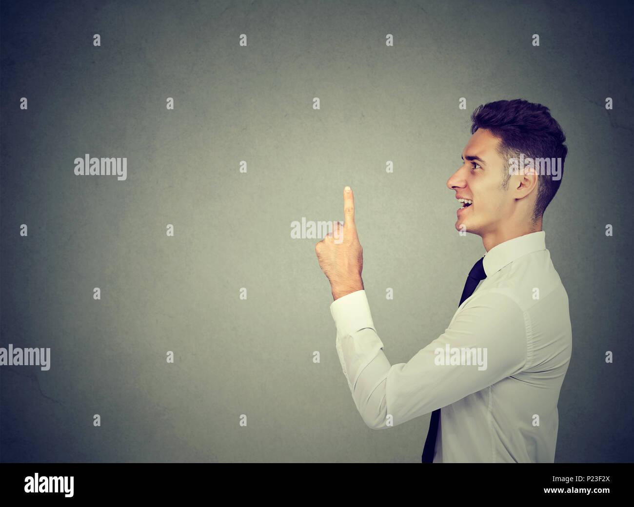 Finger pointing up man hi-res stock photography and images - Alamy