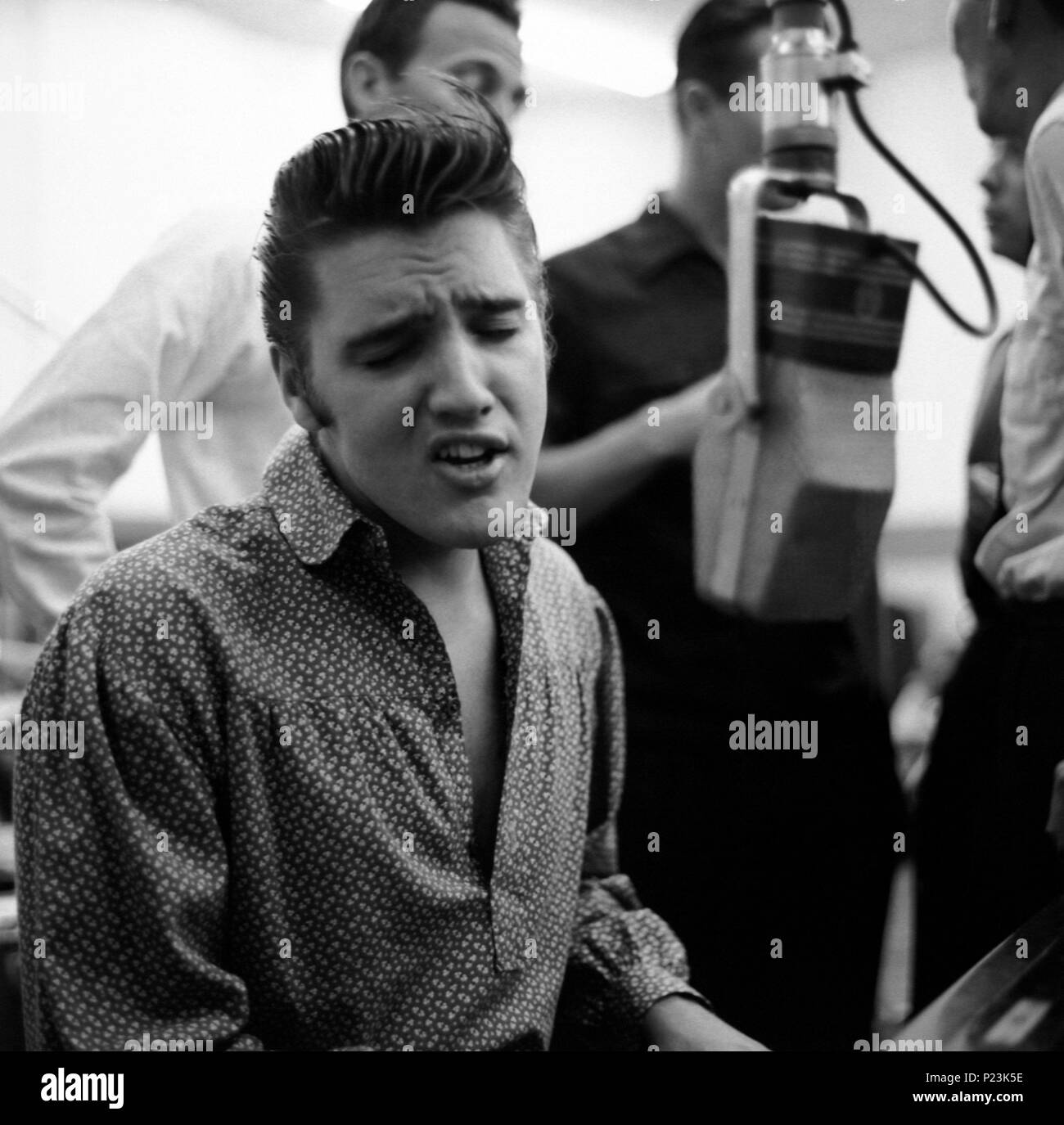 The American singer Elvis Presley during a recording session in 1956 ...