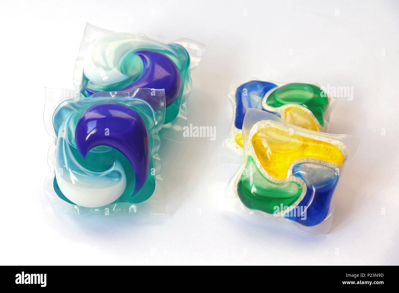 Colorful dish and laundry detergents on white background Stock Photo ...