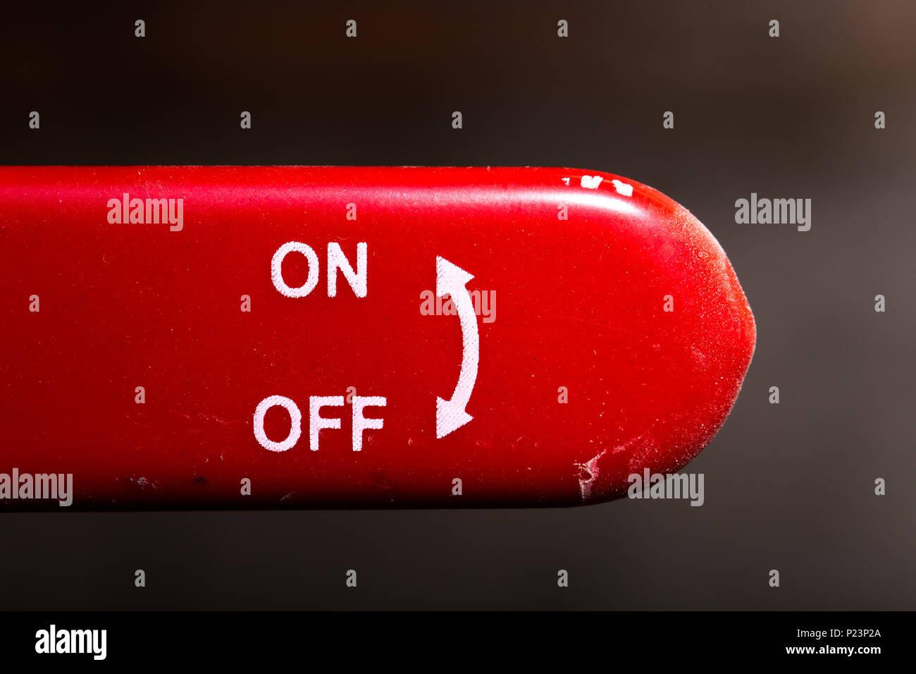 the red lever on off switch on dark background, closeup Stock Photo - Alamy
