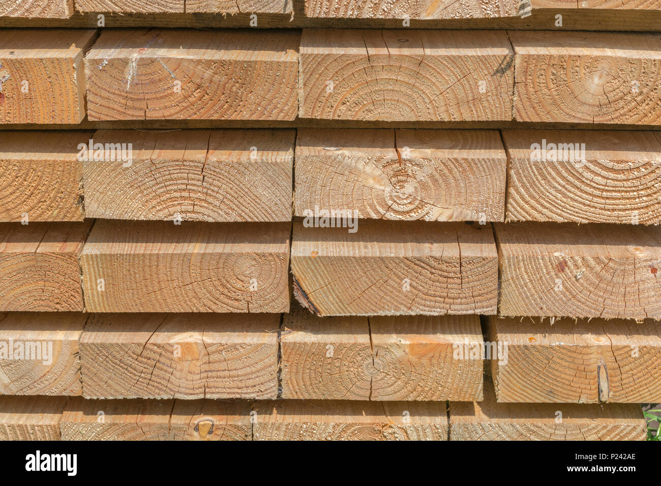 Neatly stacked timber planks. Cross section of wood Stock Photo - Alamy