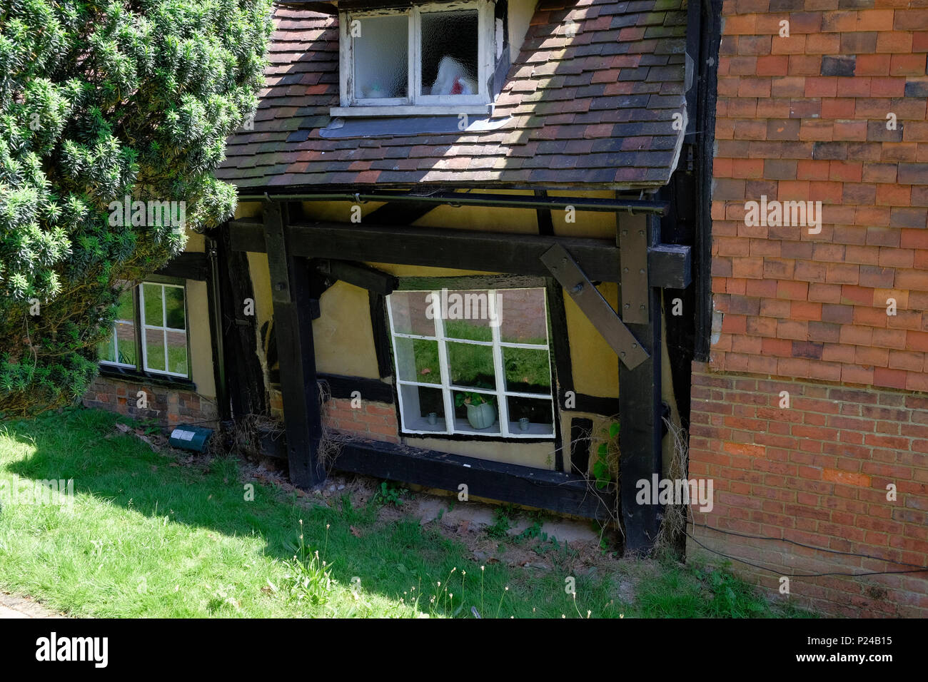 Crooked house window supported by steel plate, tenterden, kent, uk ...