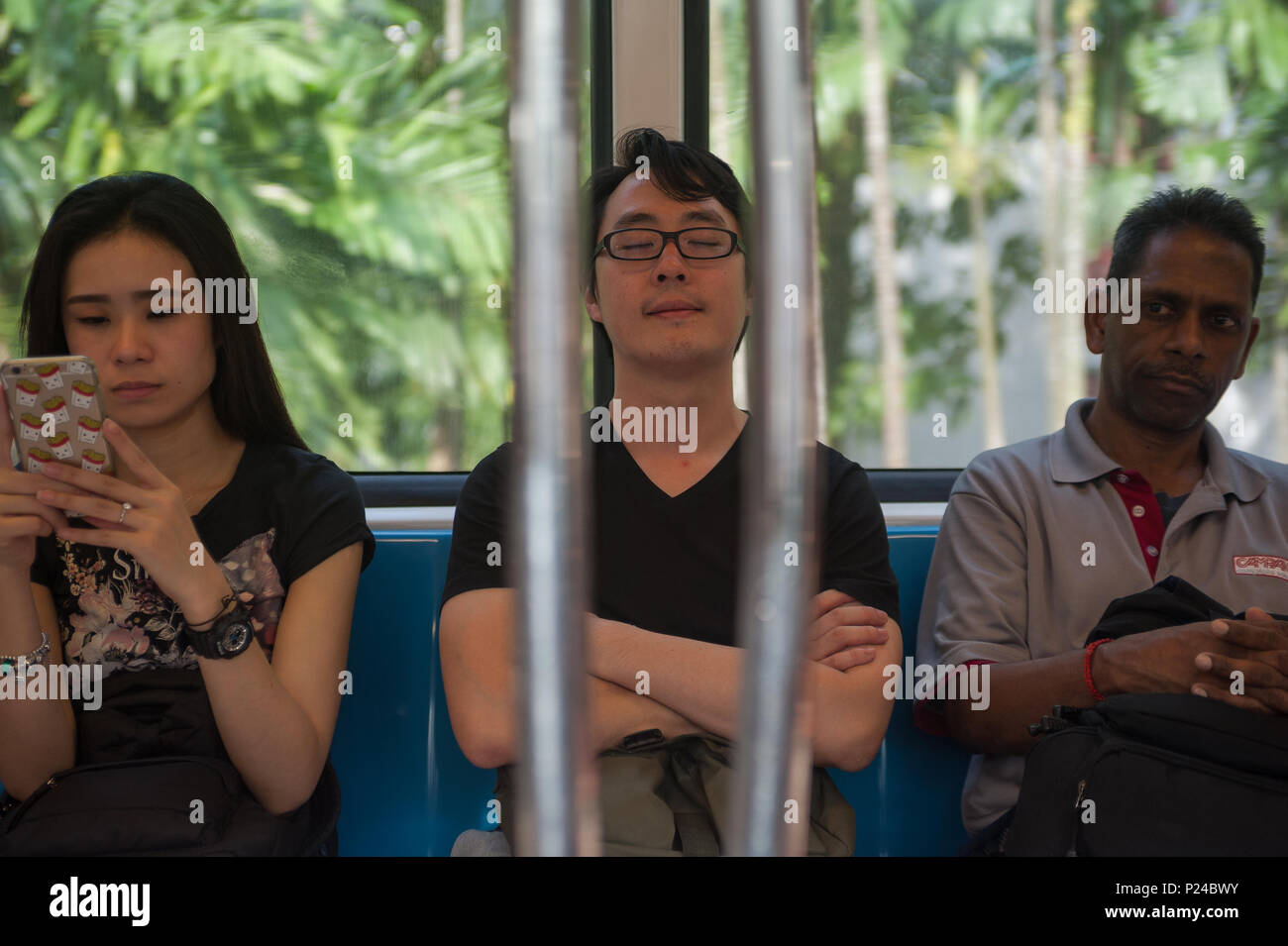 Singapore, Singapore, Passengers in a Metro Stock Photo - Alamy