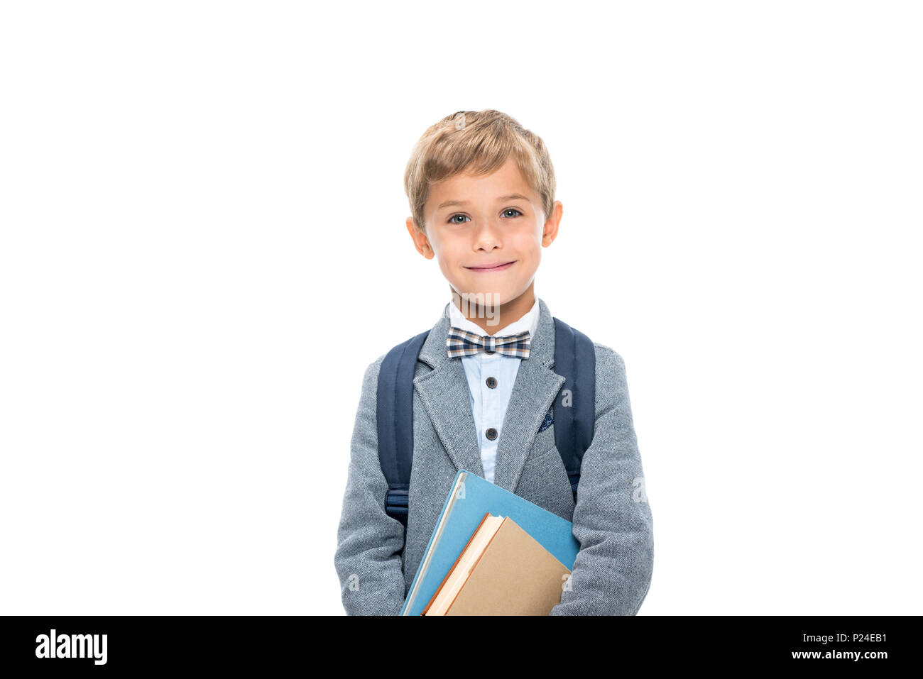happy schoolboy with books and backpack isolated on white Stock Photo ...