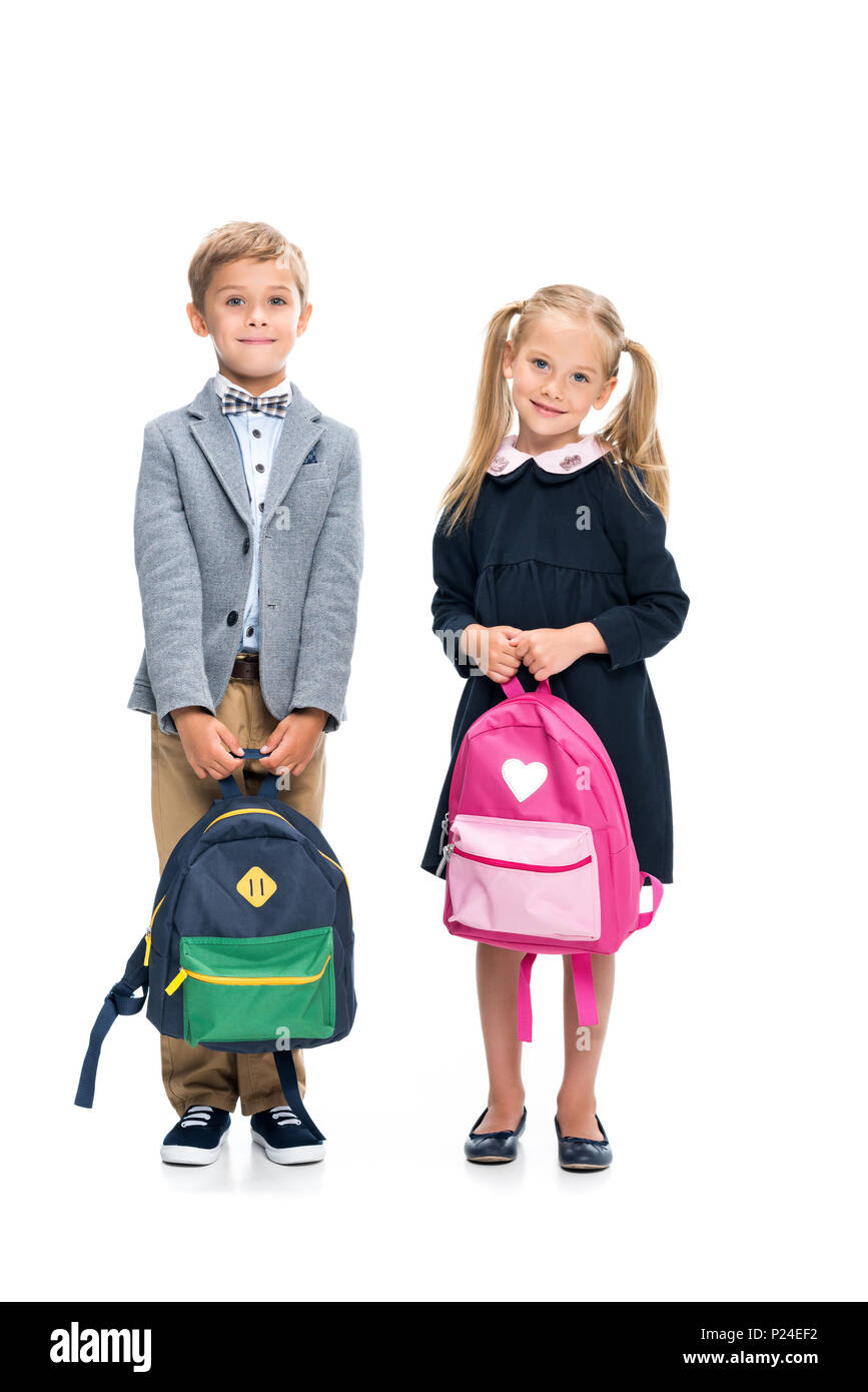 Children with school bags Cut Out Stock Images & Pictures - Alamy