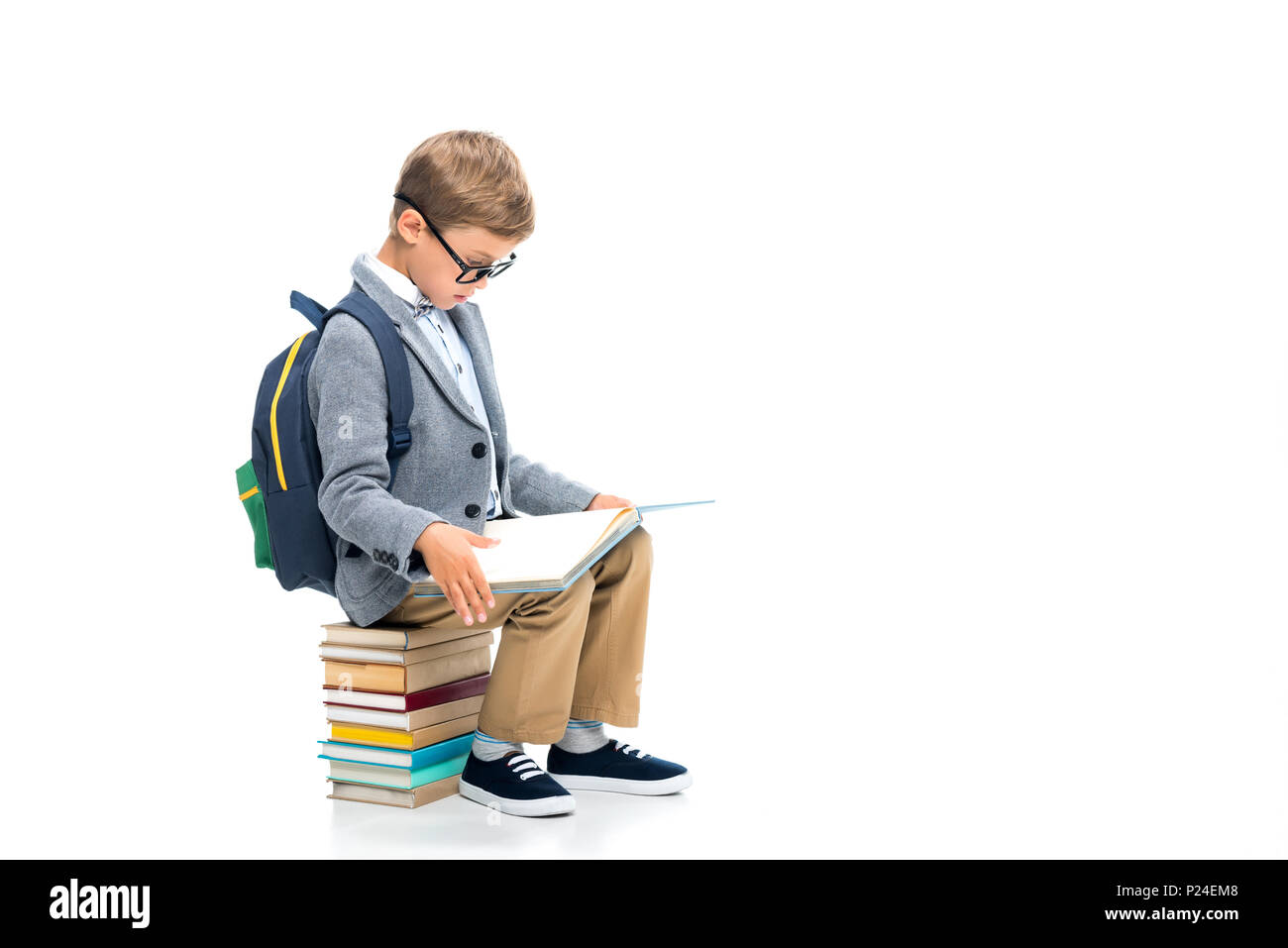 Schoolboy reading Cut Out Stock Images & Pictures - Alamy