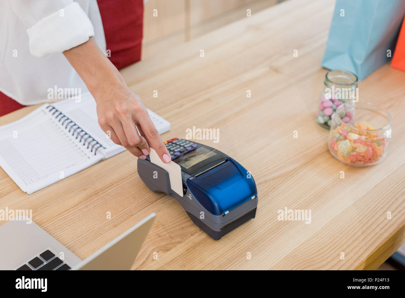 Person using pos terminal hi-res stock photography and images - Alamy