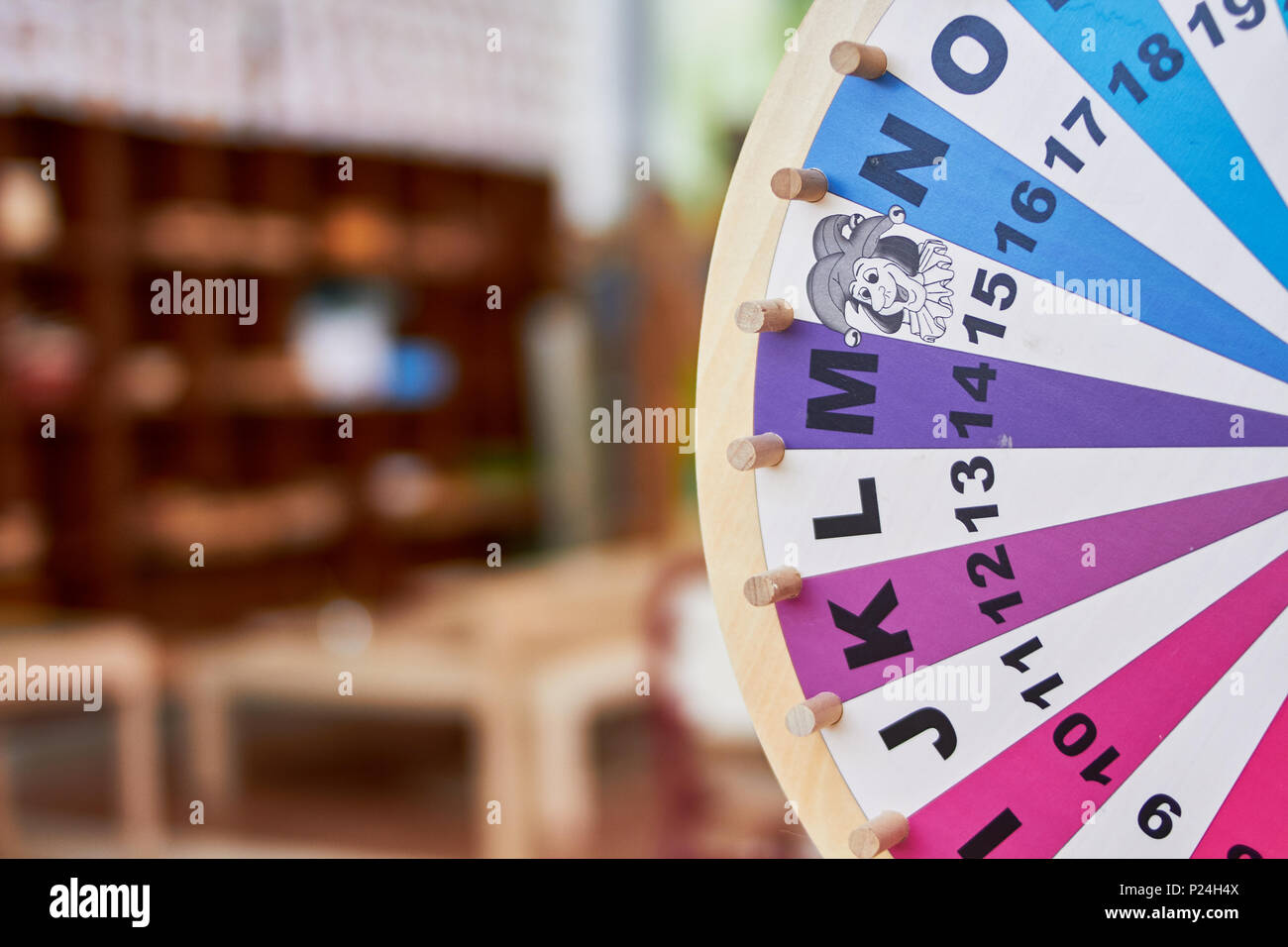Wood wheel learning letters and numbers Stock Photo - Alamy