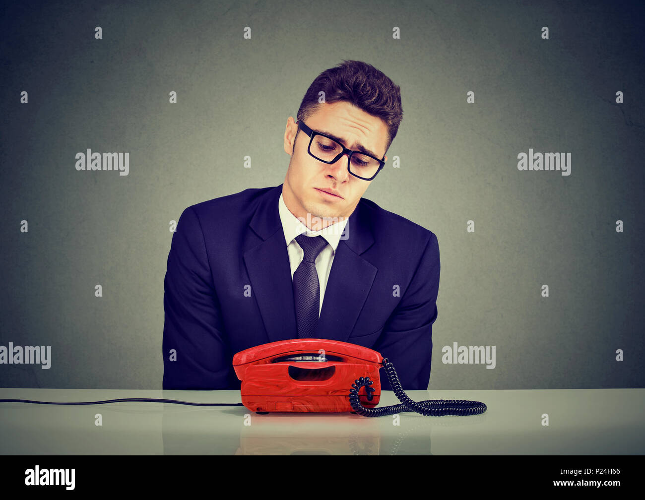 Waiting for phone to ring hi-res stock photography and images - Alamy