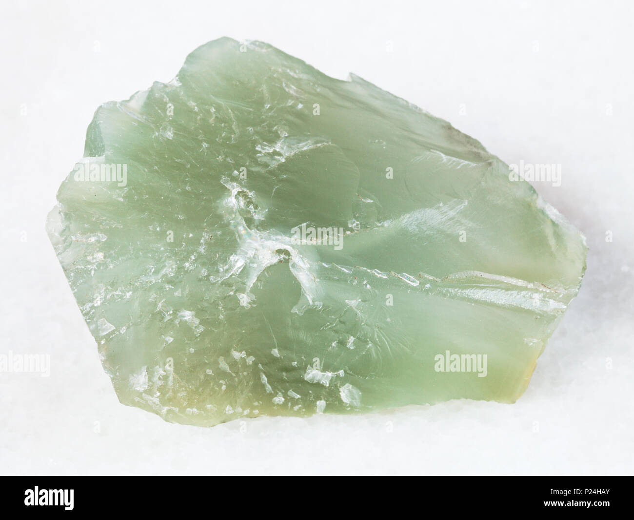 macro shooting of natural mineral - rough Prase (green quartz) stone on ...