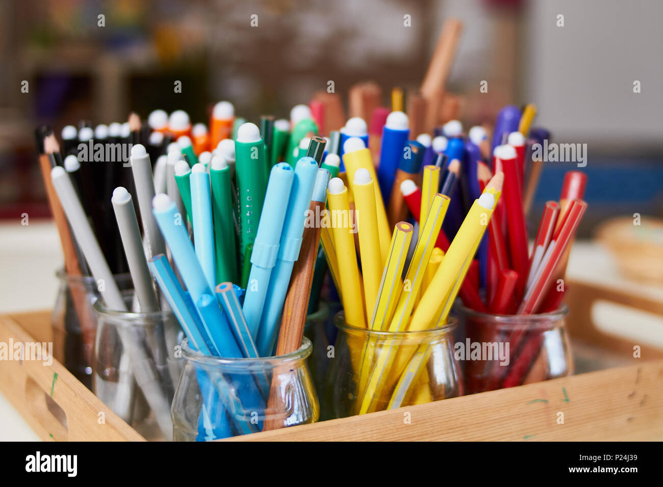 Markers set in glass cups Stock Photo - Alamy