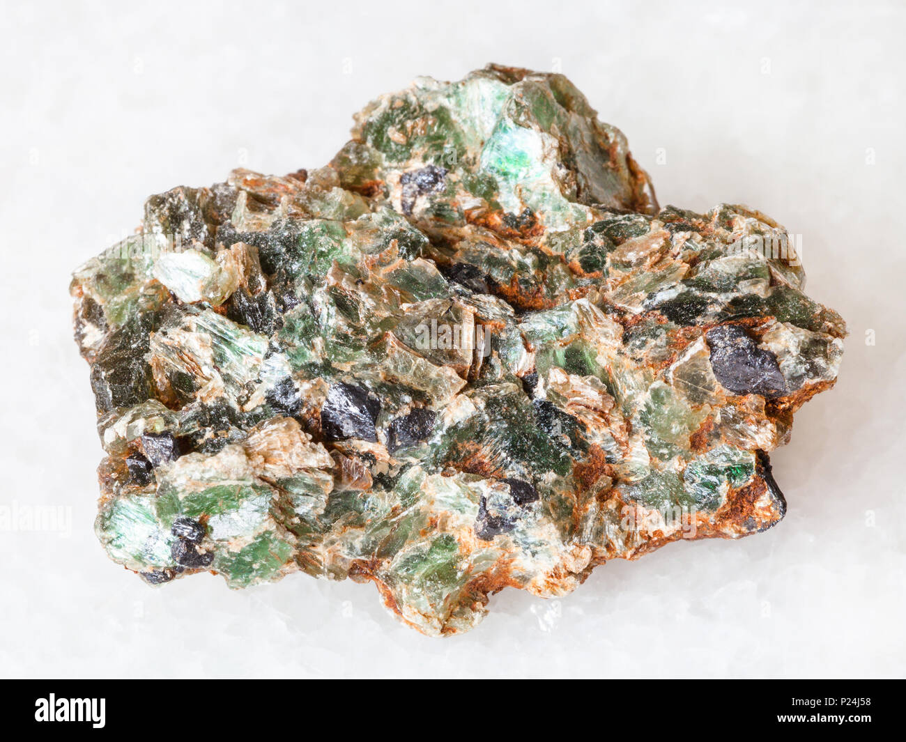 macro shooting of natural mineral - green beryl and emerald crystals in ...