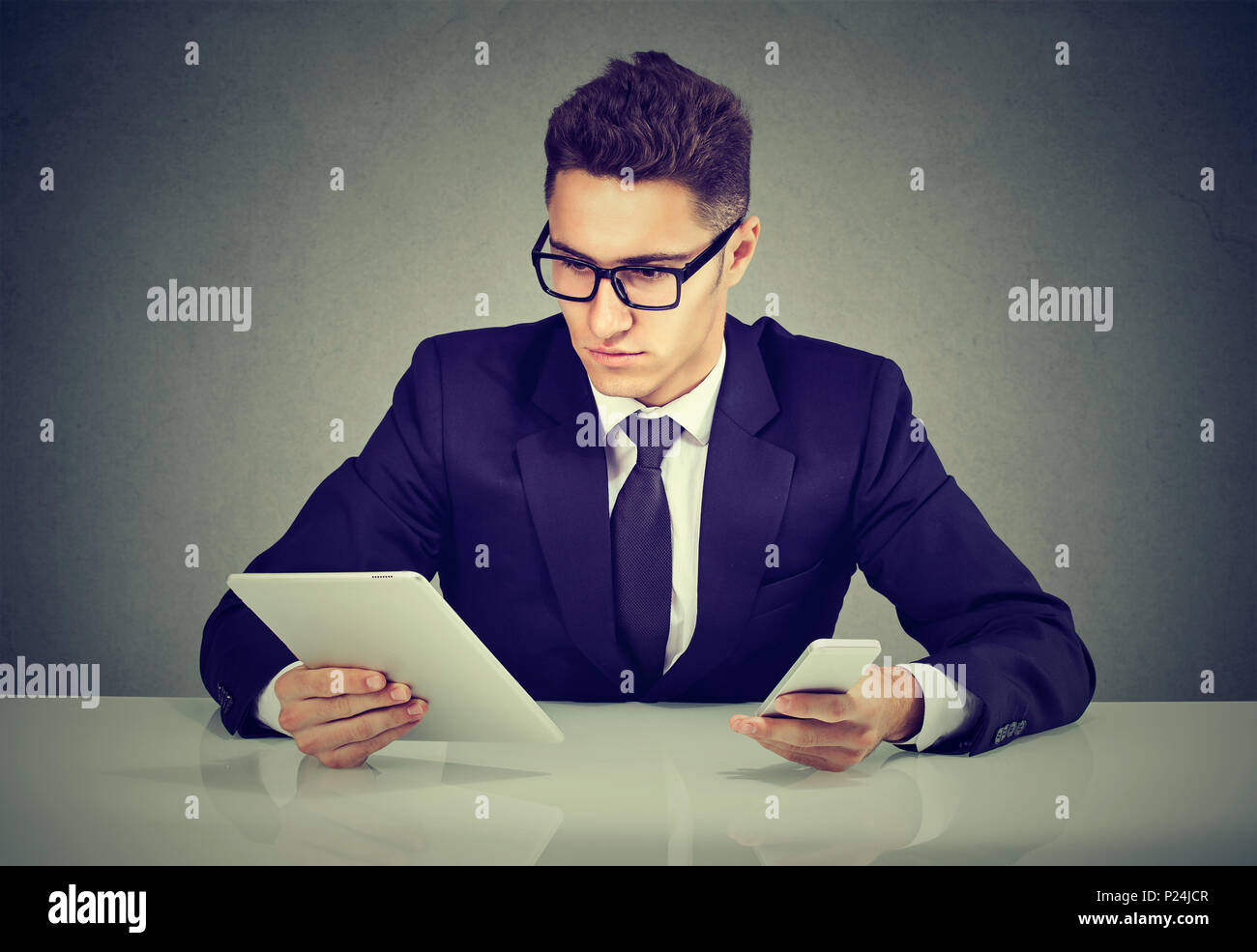 Multitasking employee hi-res stock photography and images - Alamy