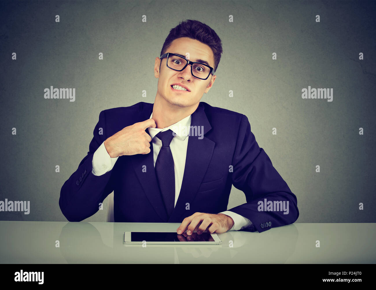 Business man pulling tie hi-res stock photography and images - Alamy