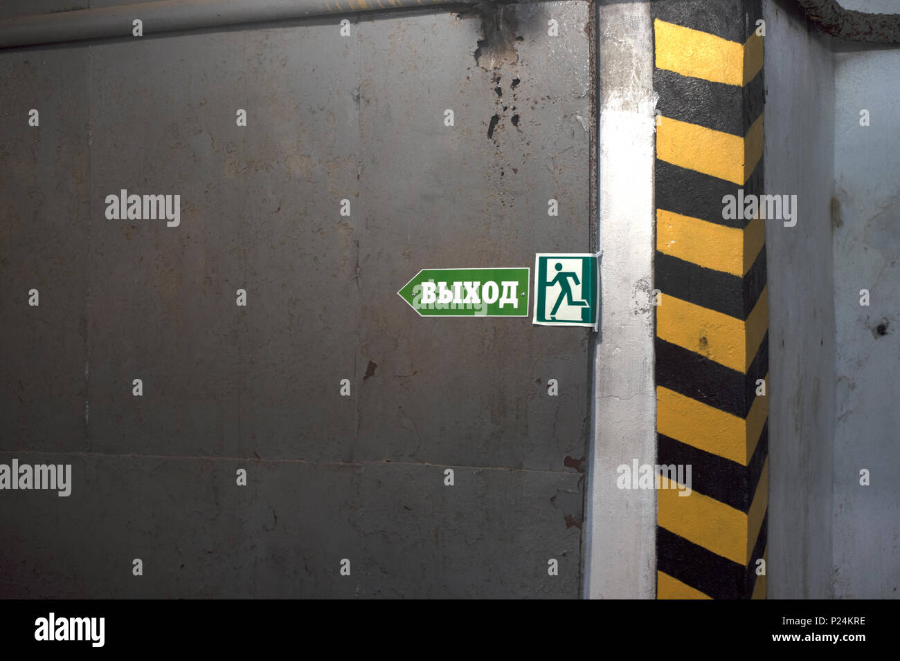 emergency exit about designation of a dangerous corner Stock Photo - Alamy