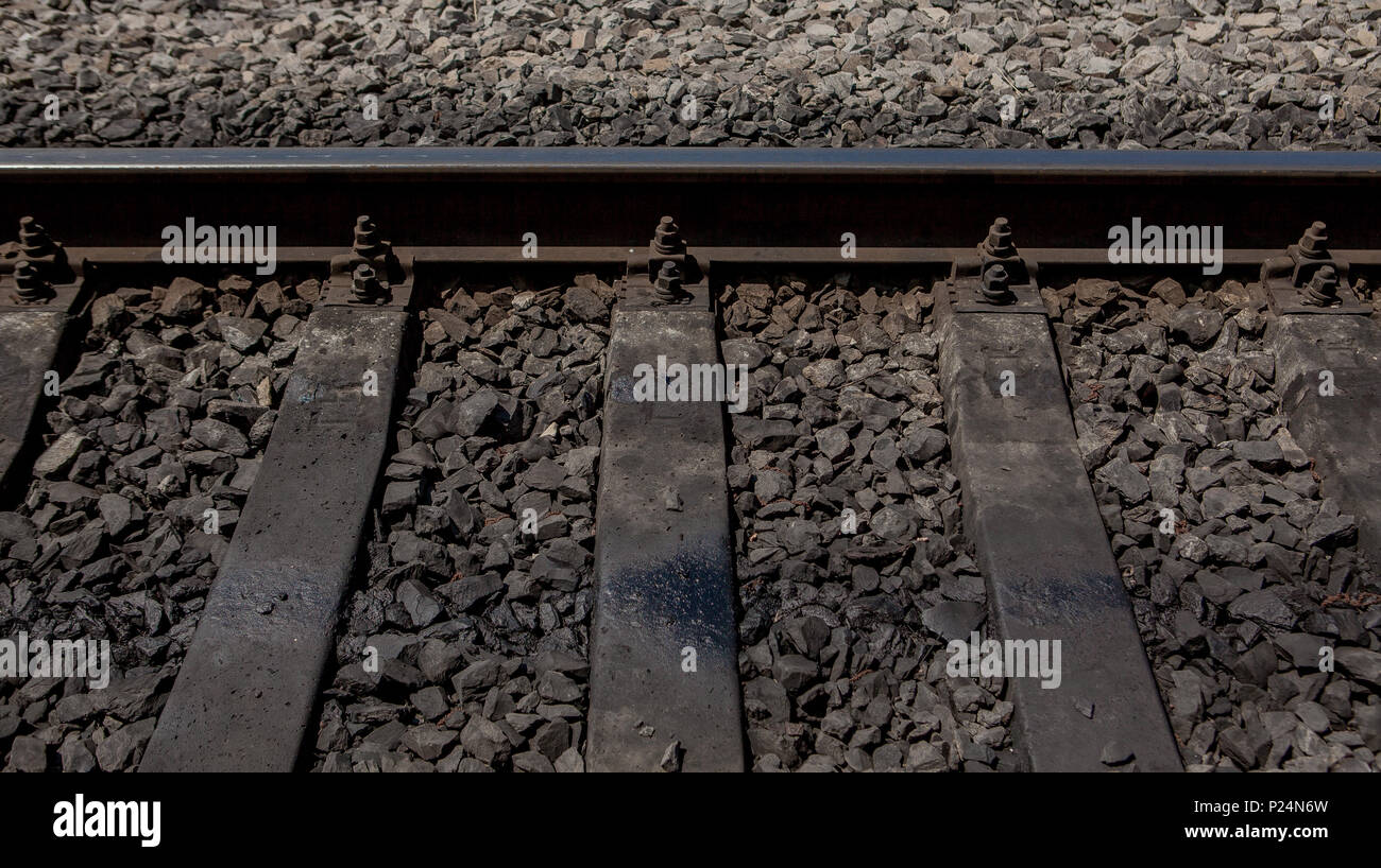 Railroad in motion at sunset. Railway station with motion blur effect ...