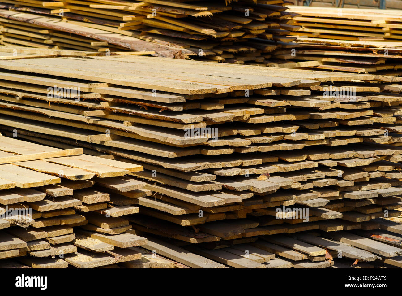 Saw-boards for production on the sawmill Stock Photo - Alamy