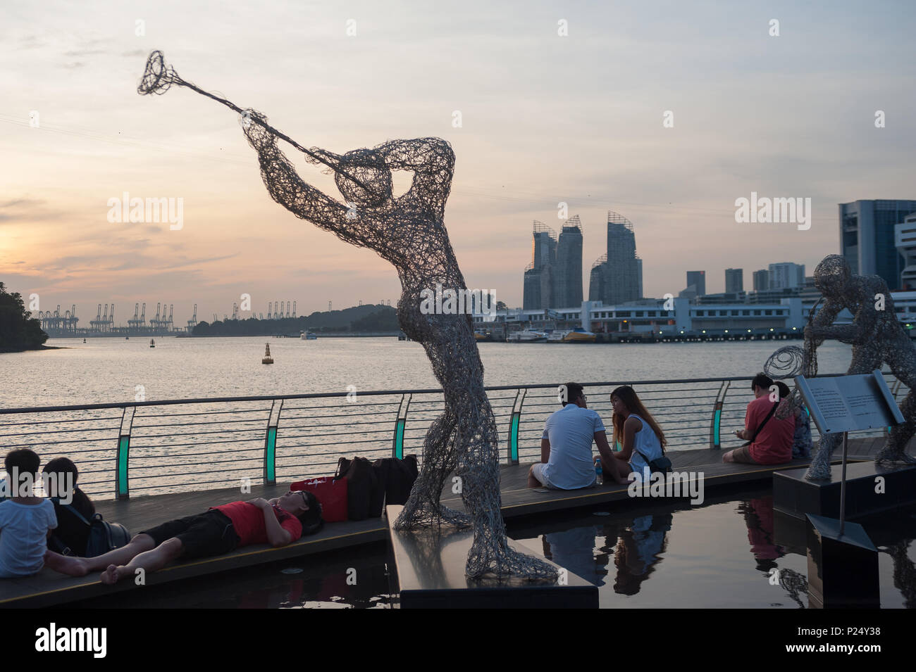 Singapore, Singapore, people on the seafront promenade on the island of ...