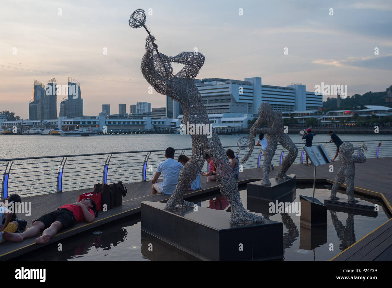 Singapore, Singapore, people on the seafront promenade on the island of ...
