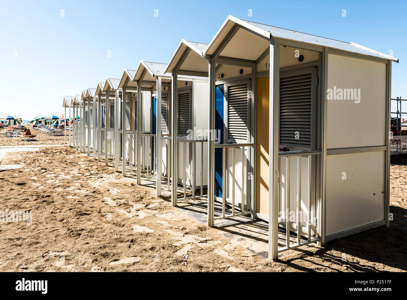 lateral view to several changing rooms on the beach, architecture on ...