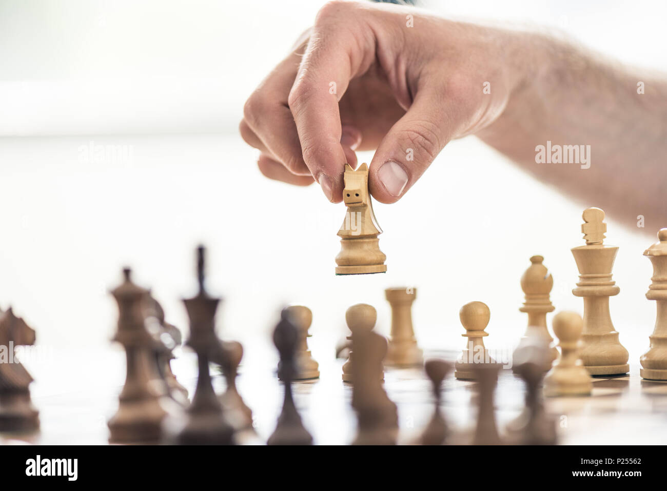 selective focus of person playing chess, cropped shot Stock Photo - Alamy