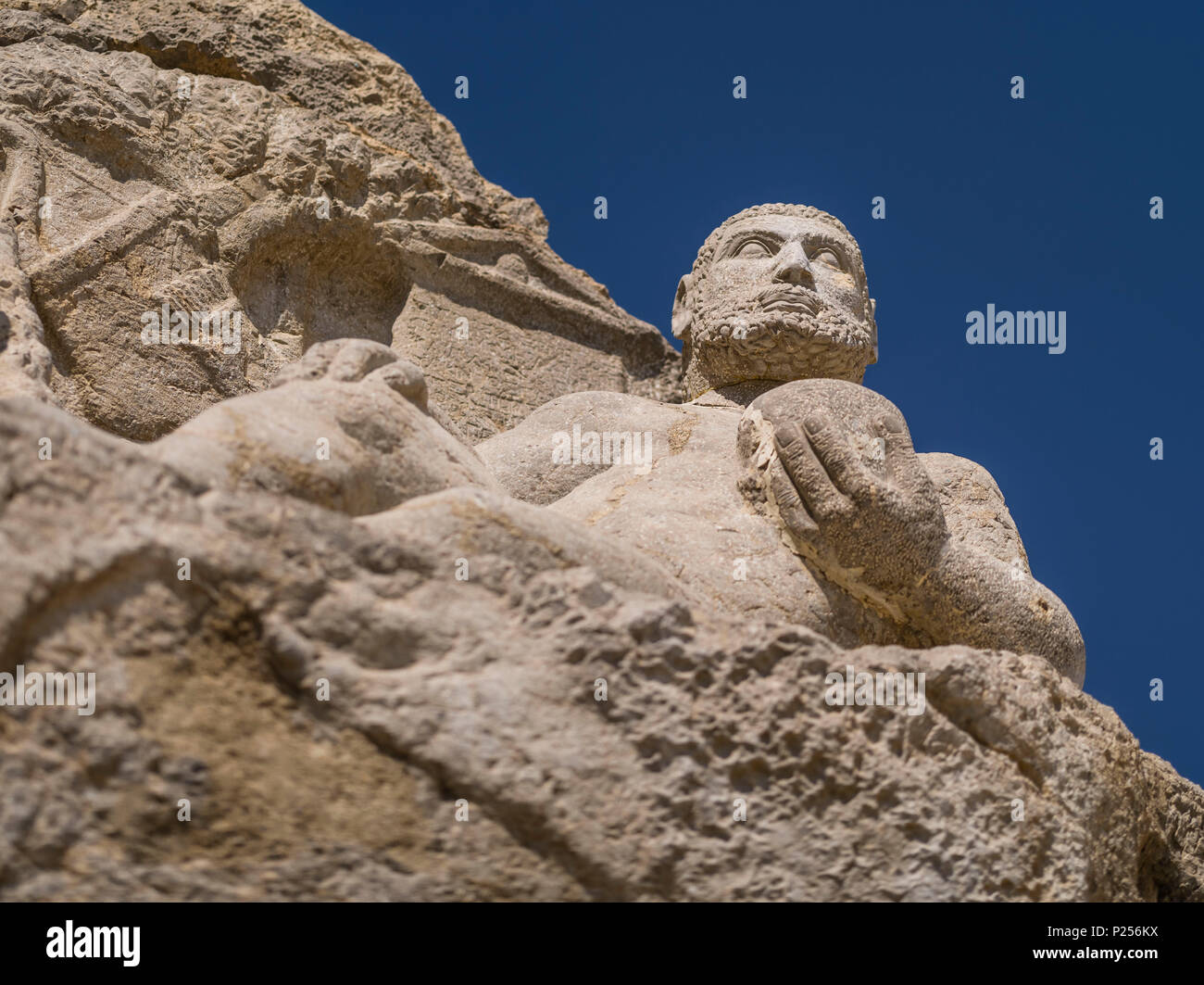 Statue of the Herakles in Bisotun Stock Photo - Alamy