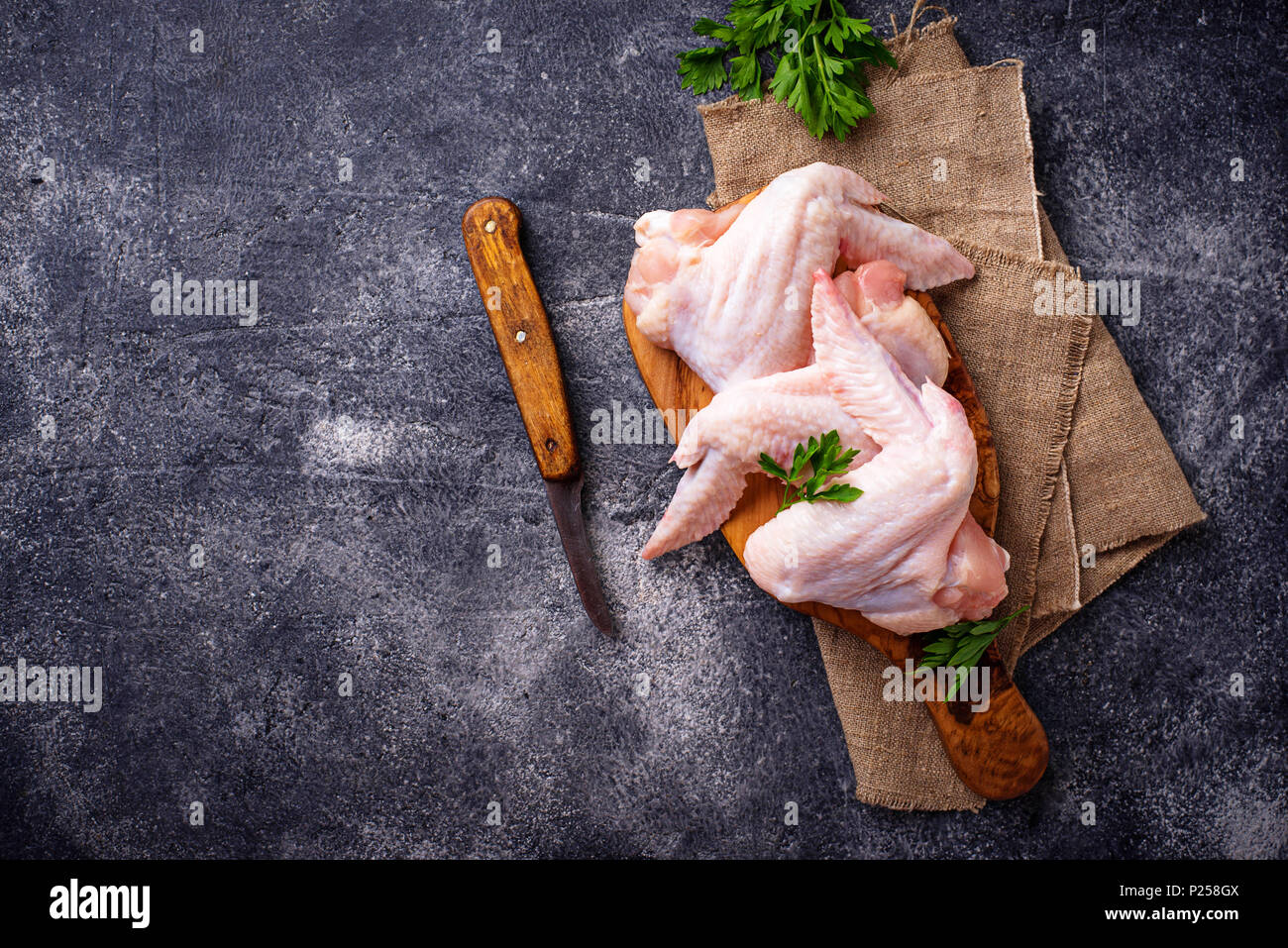 Raw chicken wing hi-res stock photography and images - Alamy