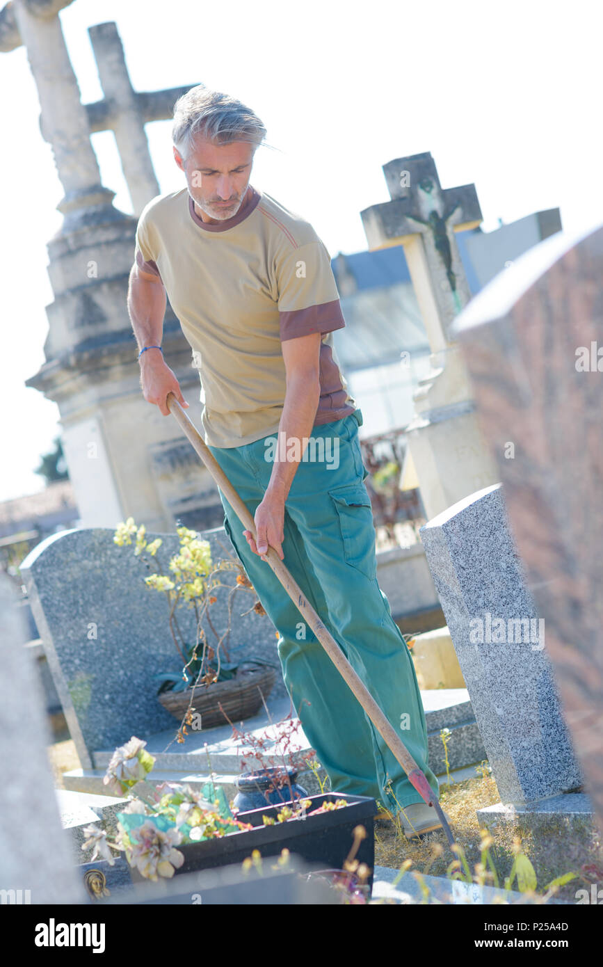 Gravestone cleaning hi-res stock photography and images - Alamy