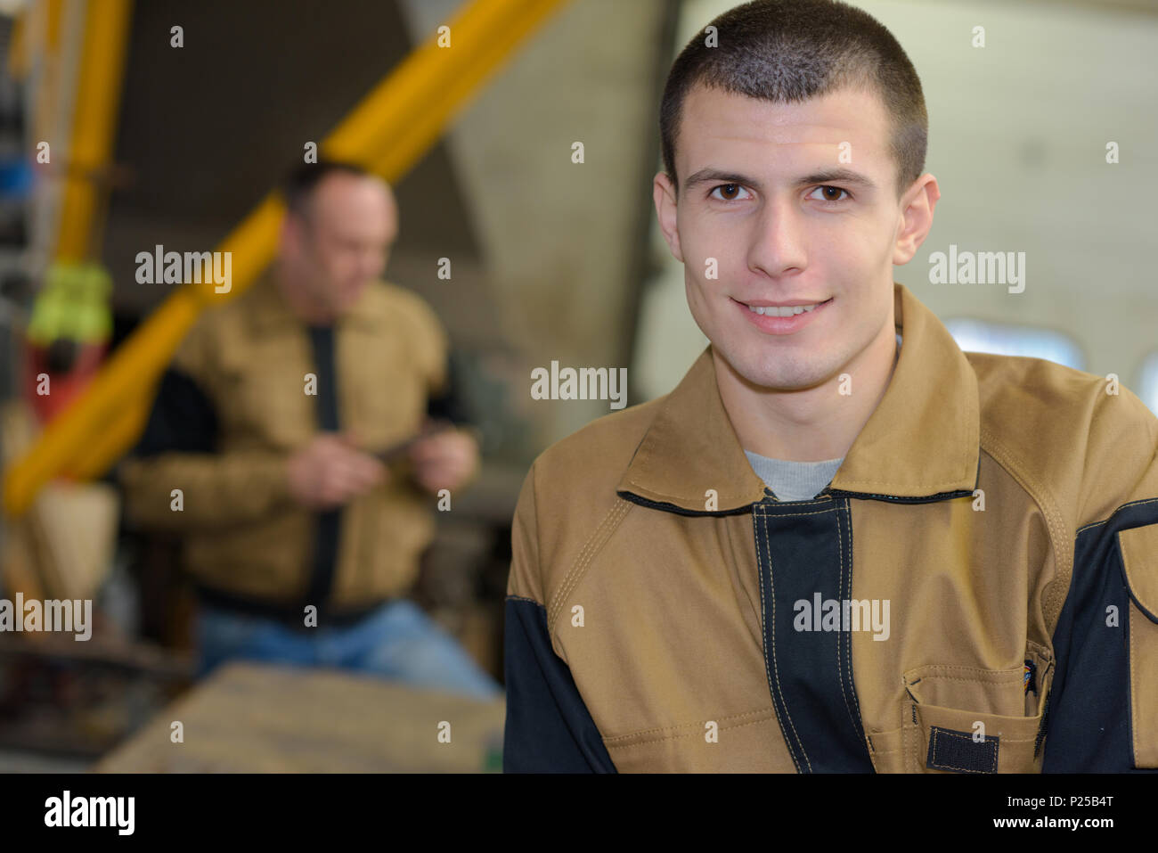 Teenage happy apprentice hi-res stock photography and images - Alamy