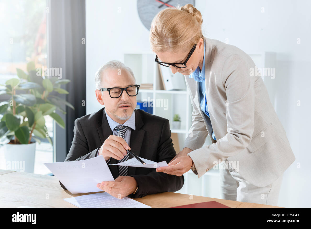 serious mature businesspeople working together in modern office Stock ...