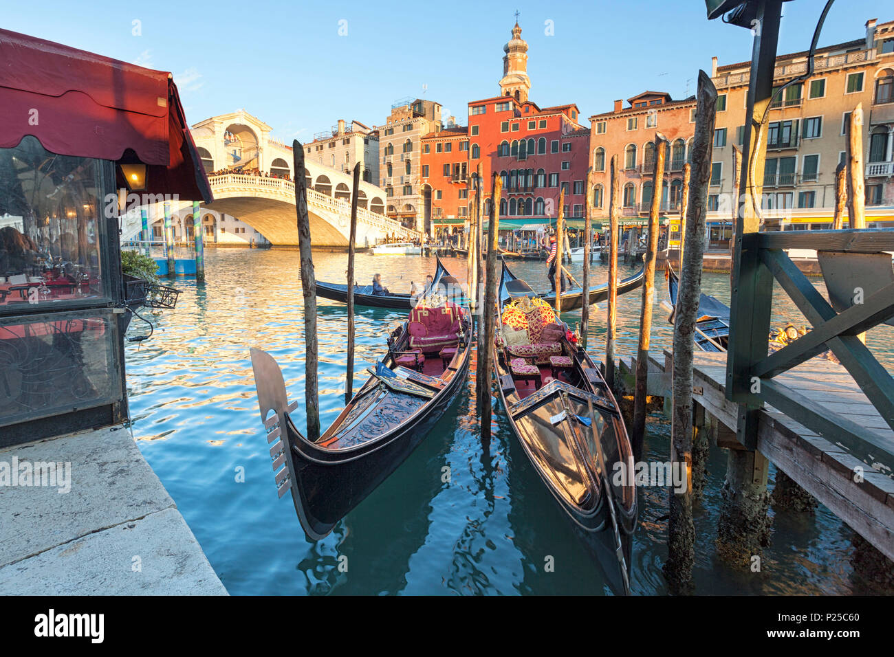 Two traditional venetian gondolas in front of Rialto Bridge, Canal ...
