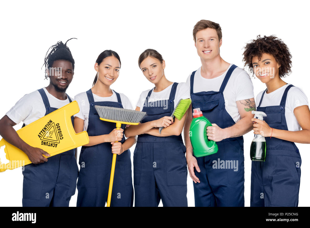 group of young multiethnic cleaners with various cleaning supplies ...