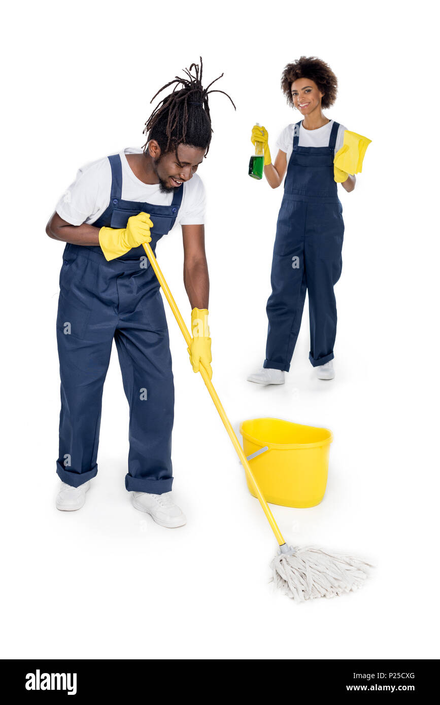 professional young african american cleaners washing floor together ...