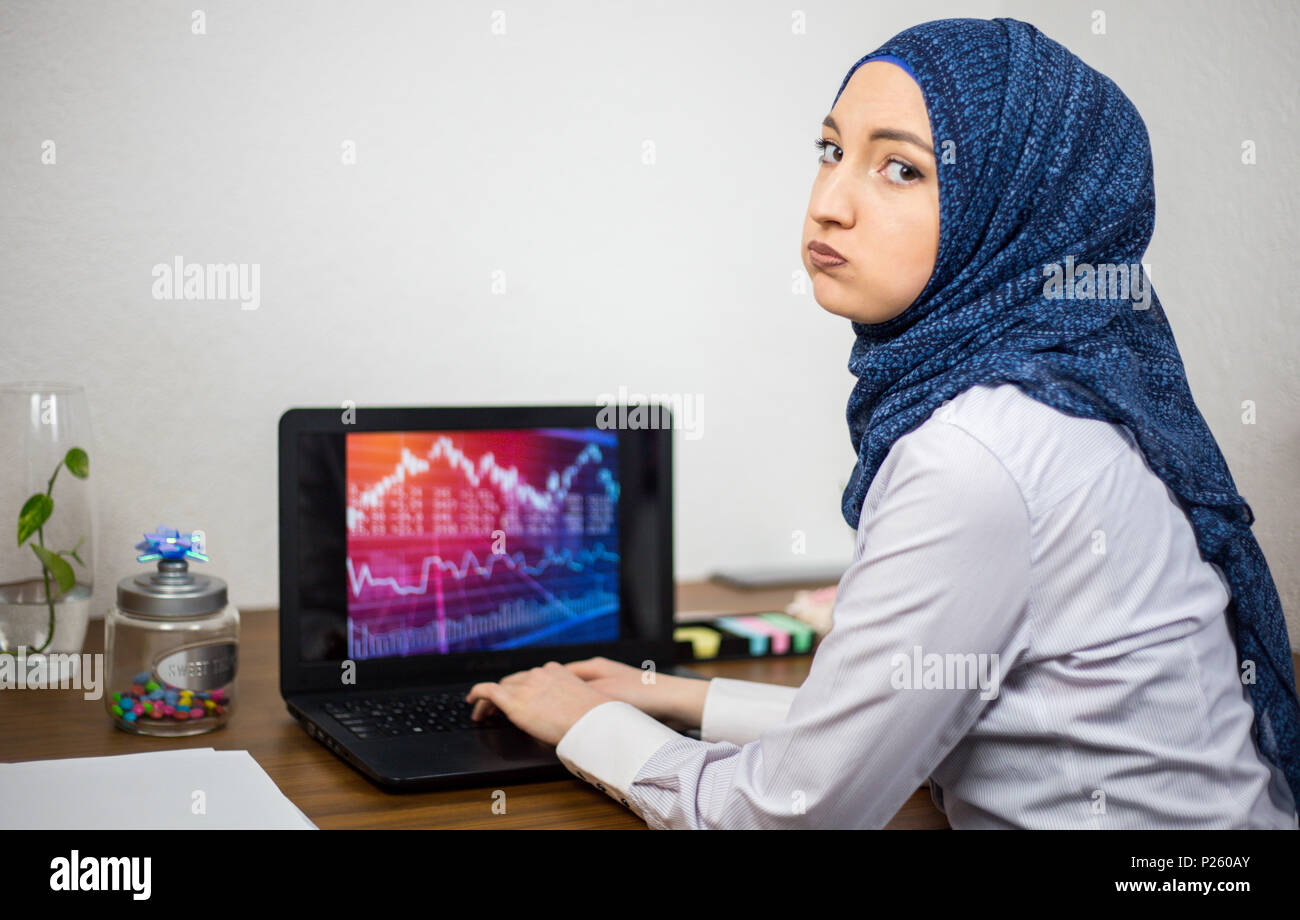 Imaginary covered young Muslim with hijab, in office, business and ...