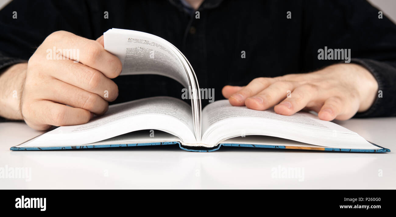 Businessman reading dictionary hi-res stock photography and images - Alamy