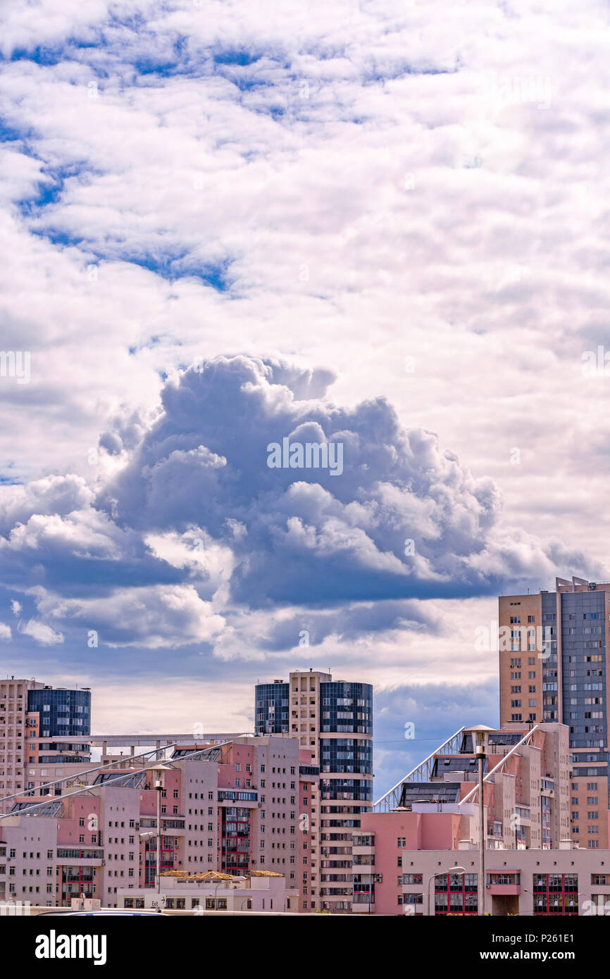 Dark Clouds Over Modern Buildings Stock Photo - Alamy