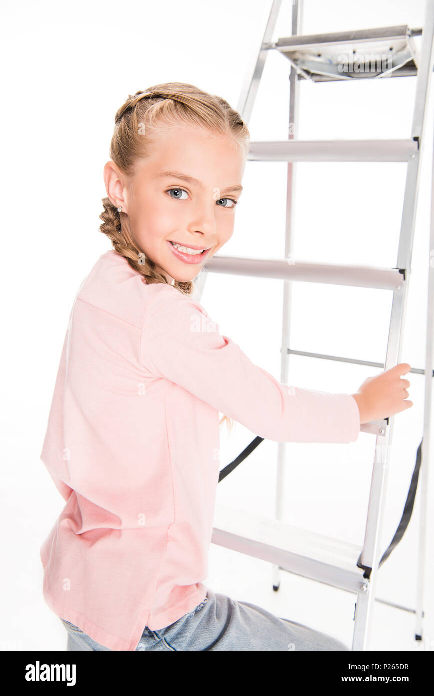 Child up ladder hi-res stock photography and images - Alamy