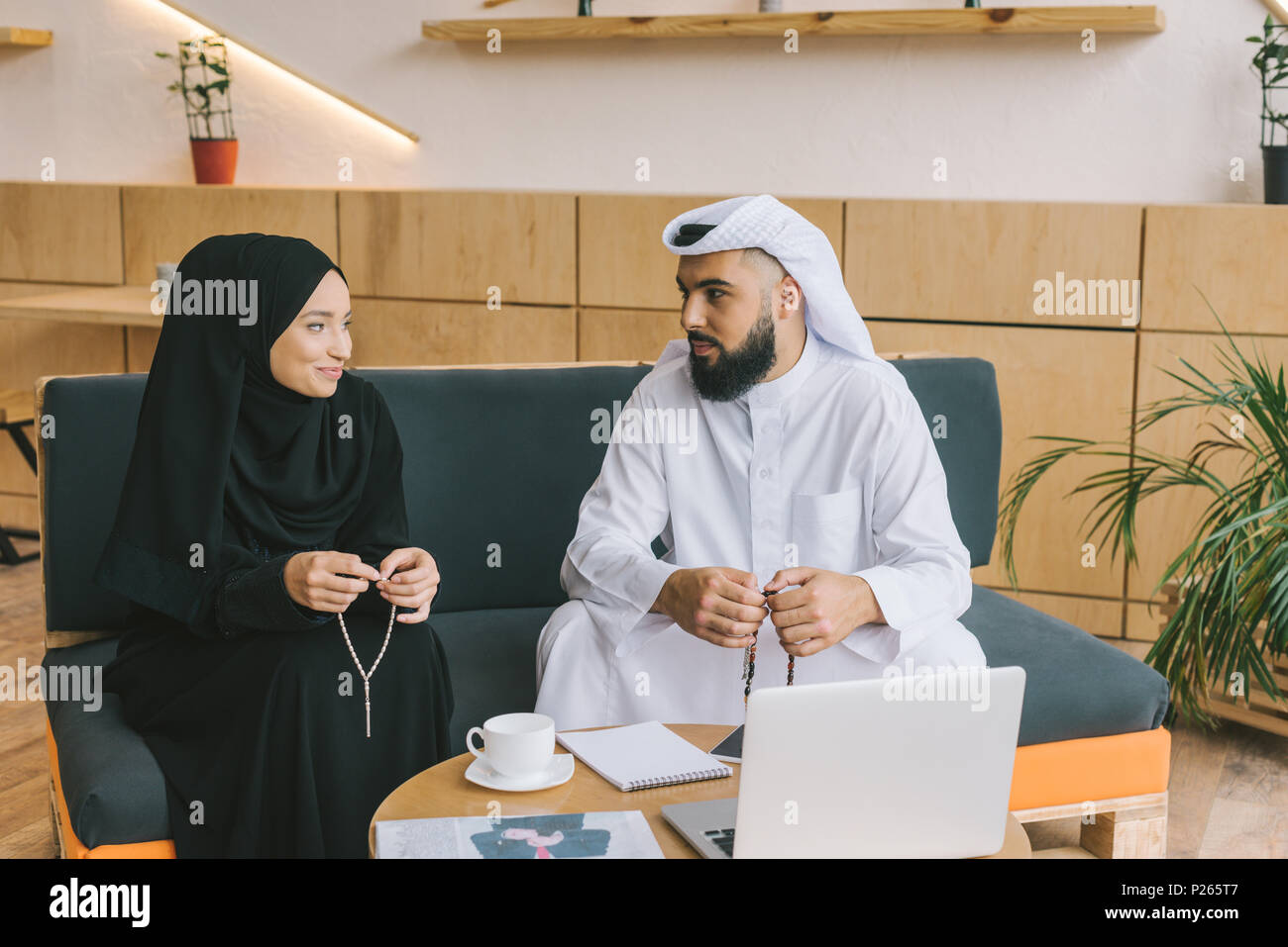 Muslim woman sitting on prayer hi-res stock photography and images - Alamy