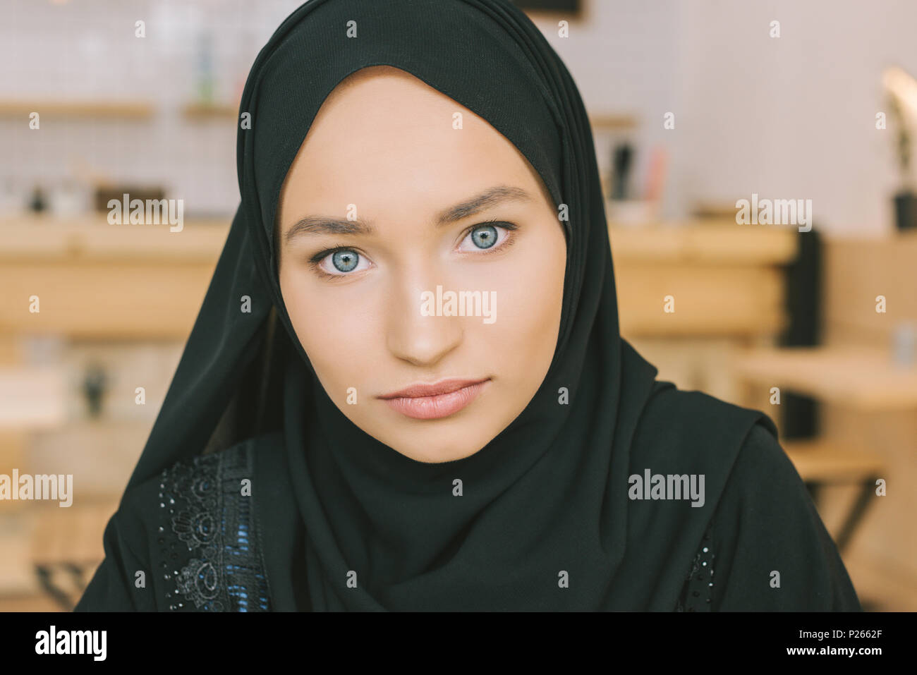 close- up portrait of muslim woman in hijab looking at camera Stock ...