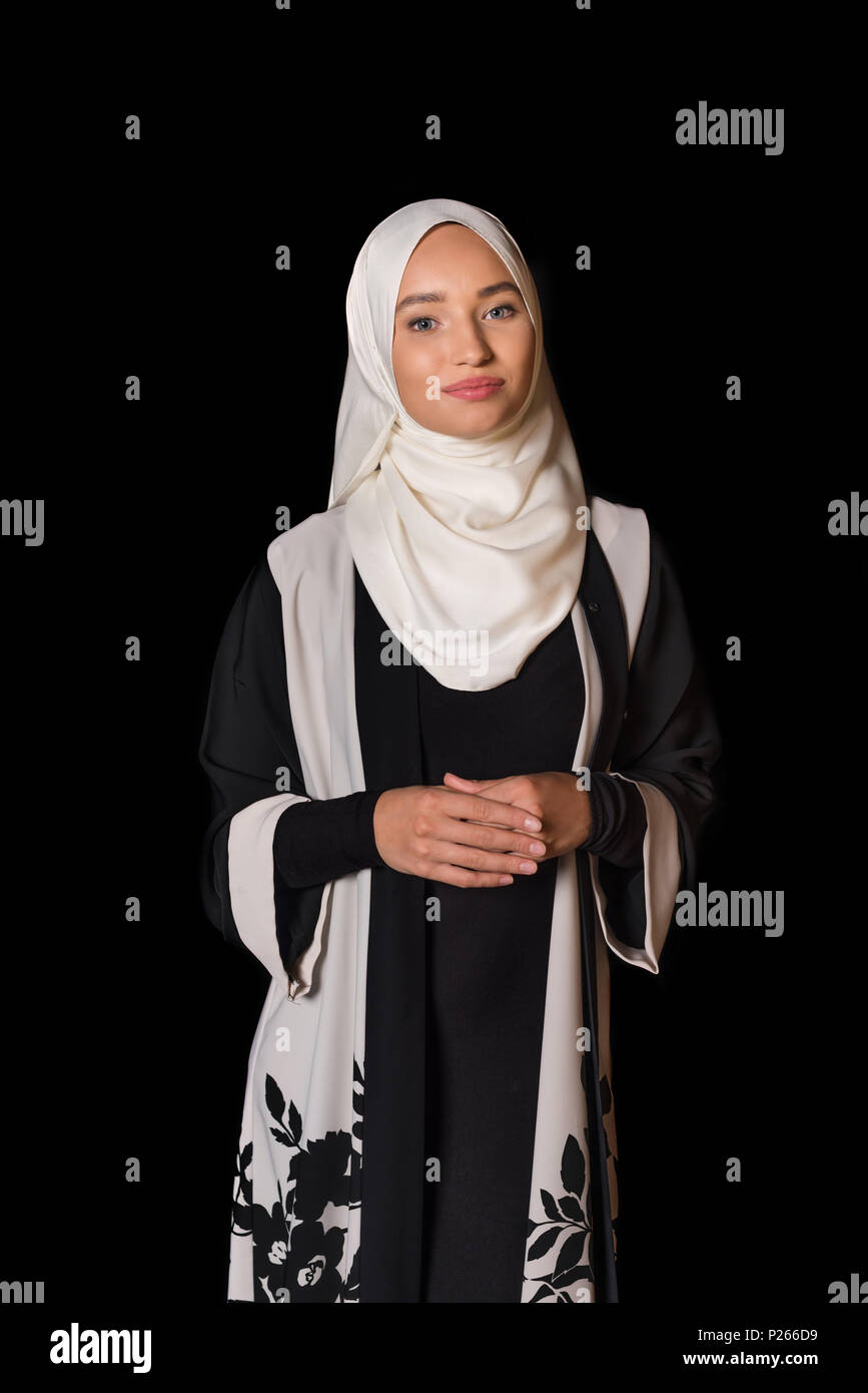 beautiful muslim woman in traditional clothing isolated on black Stock ...