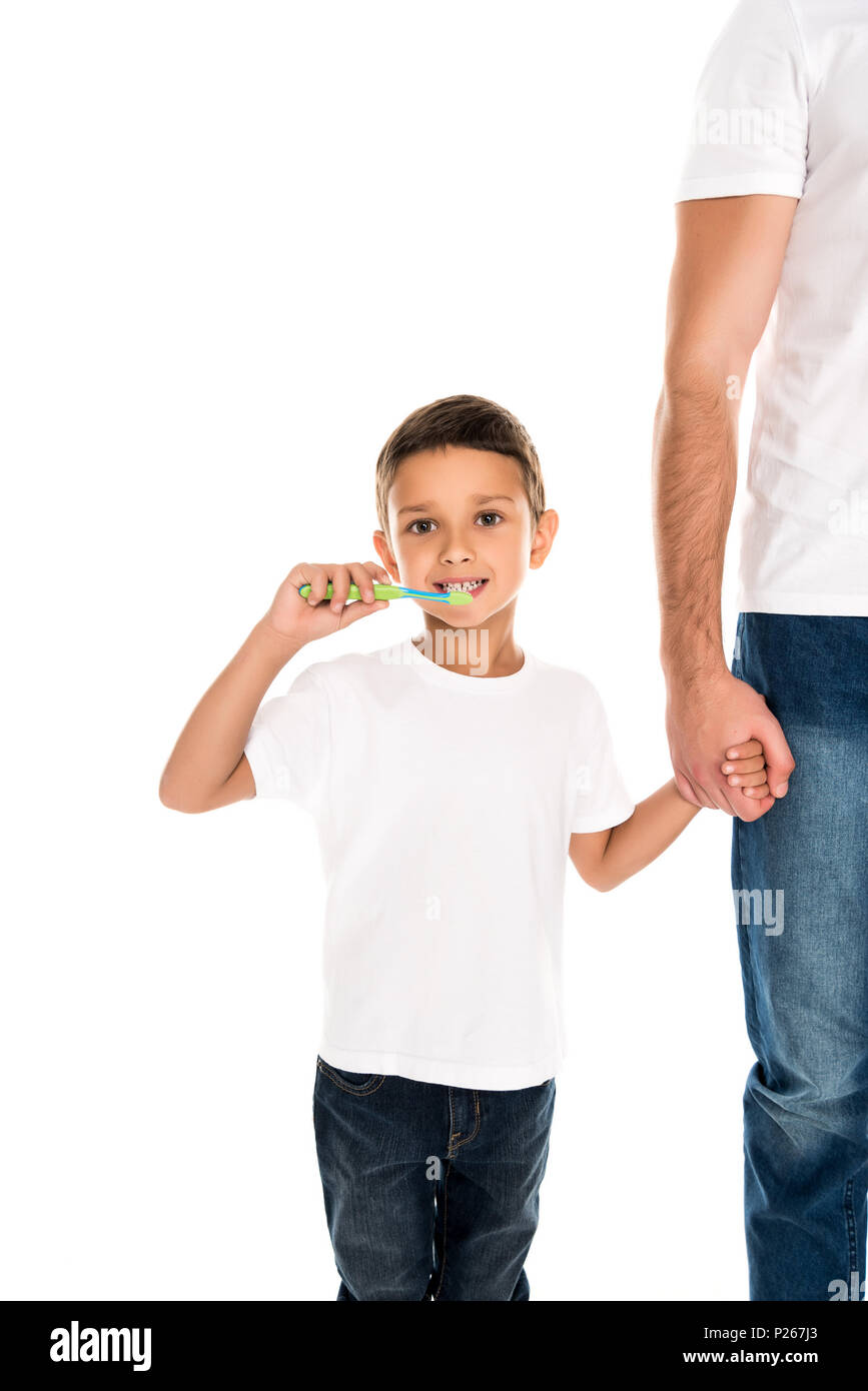 Father brush holding boy hi-res stock photography and images - Alamy