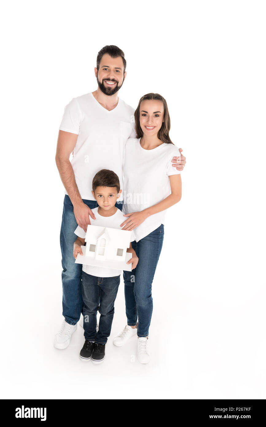 little boy with family model in hands and parents near byisolated on ...