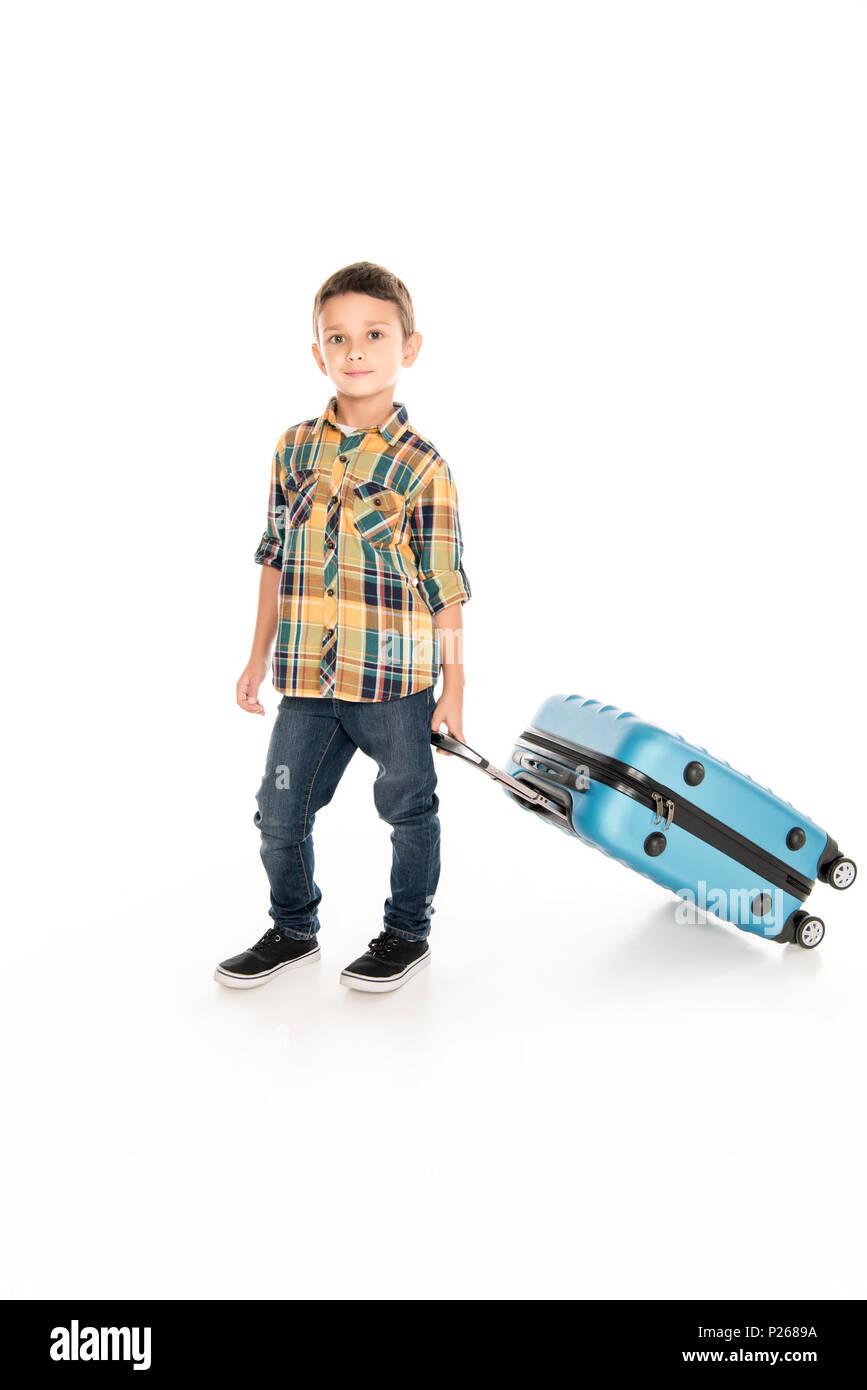 happy little boy with suitcase ready for journey, isolated on white ...