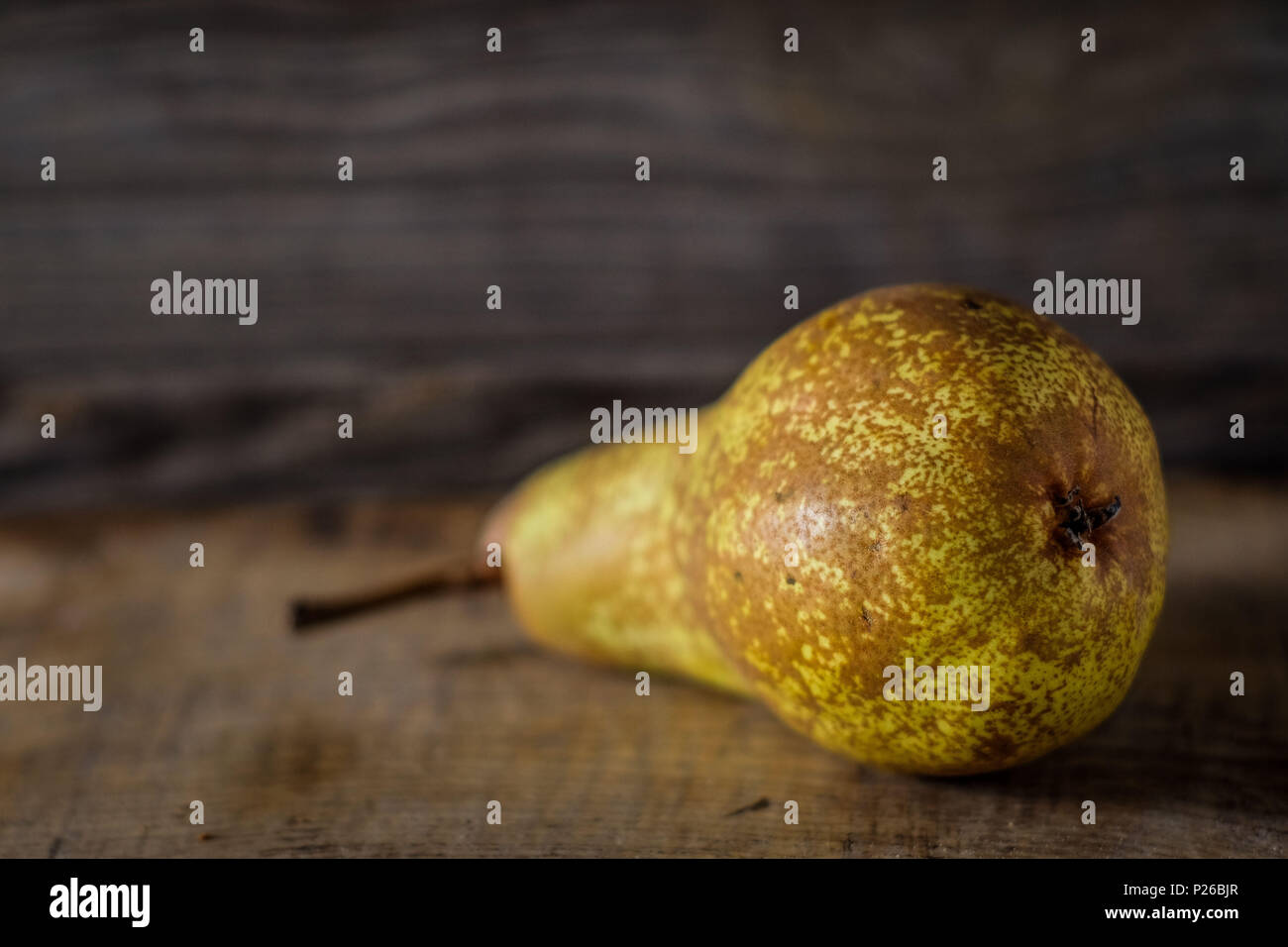 Pear on rustic wood hi-res stock photography and images - Alamy