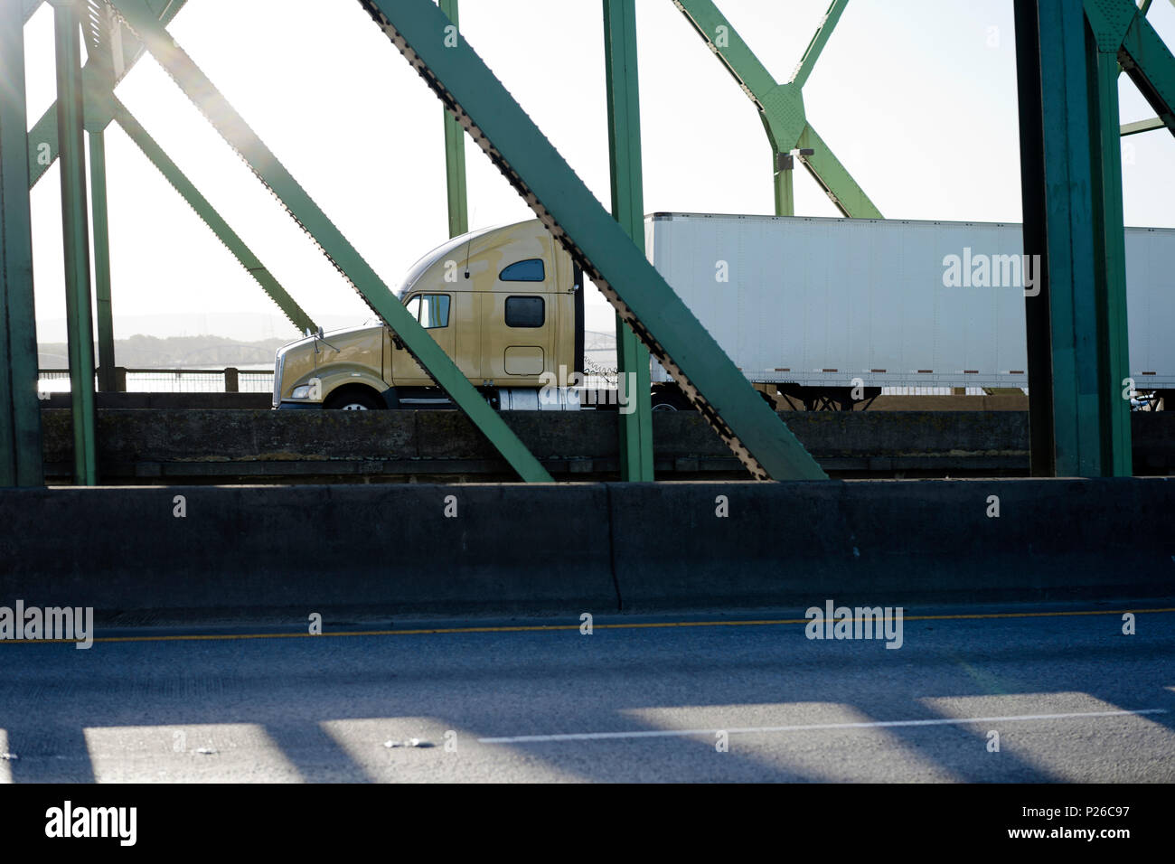 Profile of gold big rig long haul semi truck with full size dry van ...