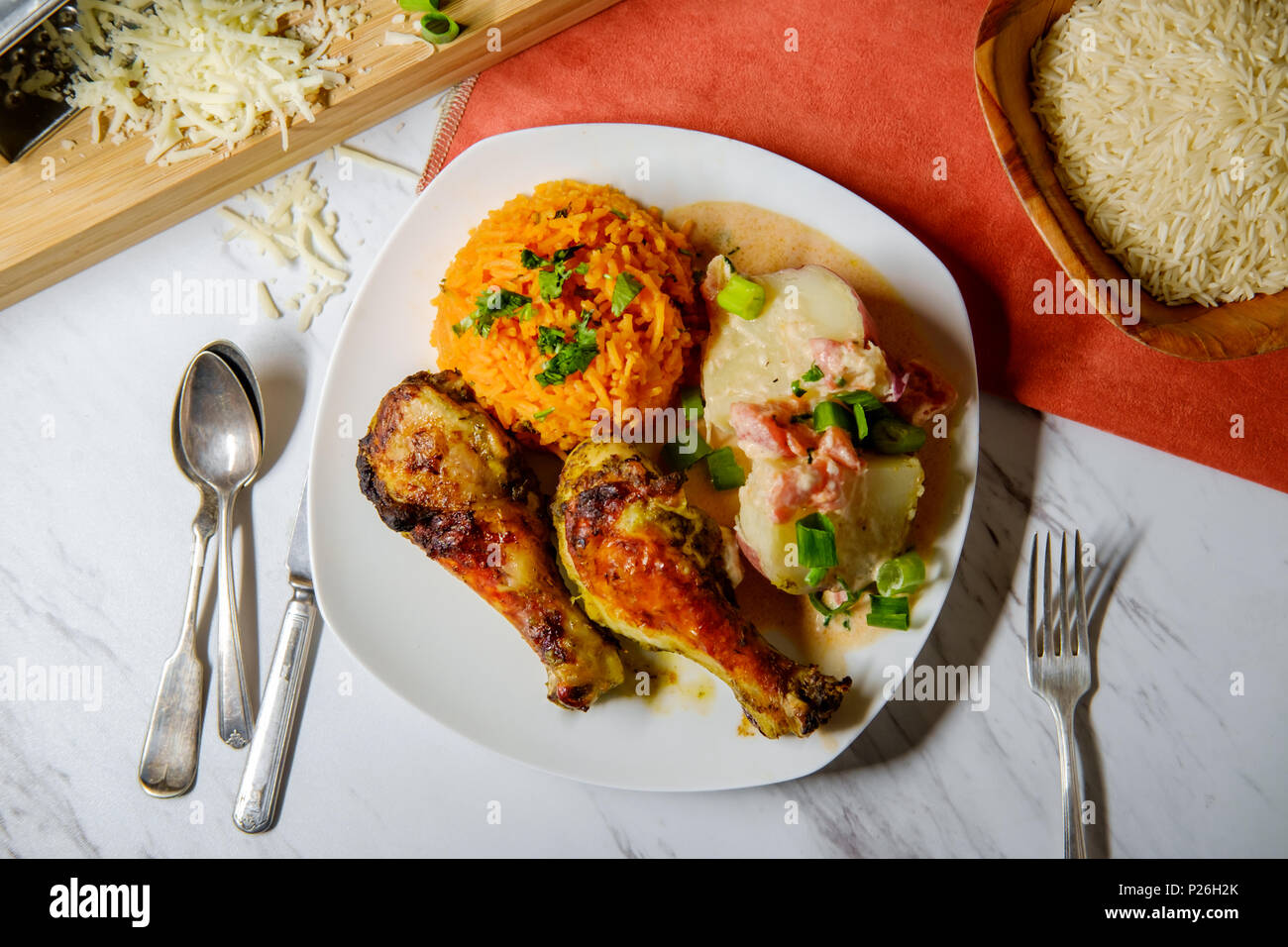 Colombian cuisine papas chorreadas roasted chicken legs and Stock Photo ...